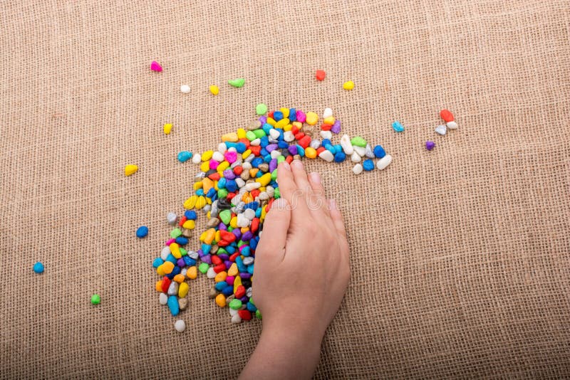Pebbles on hand stock photo. Image of woman, yang, pebbles - 80248176