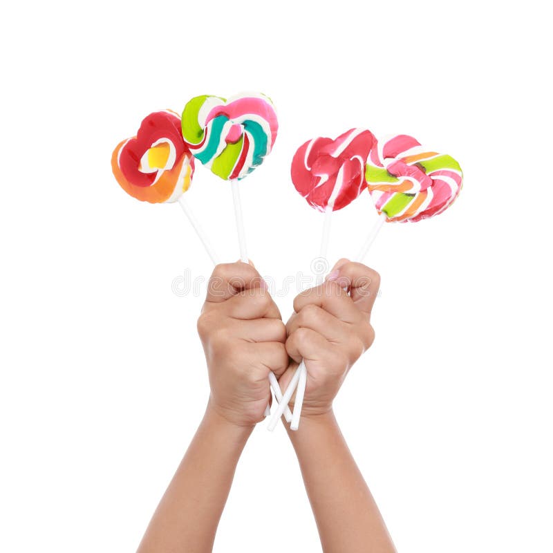 Children's Hand With Lollipop Stock Photo - Image of sweets, pretty ...