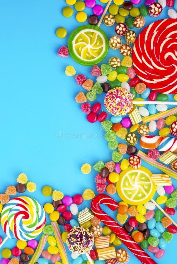 Colorful Lollipops and Different Colored Round Candy. Top View. Stock ...