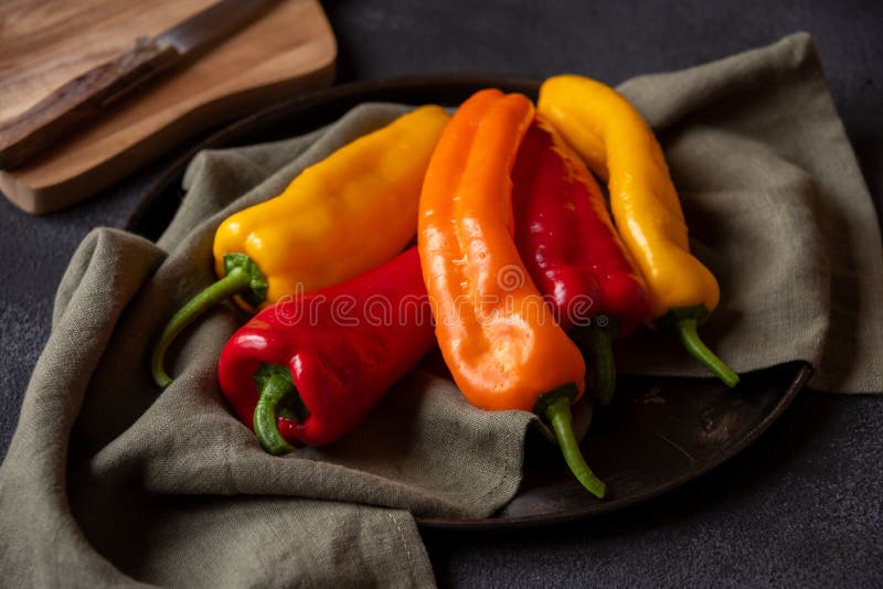 Colorful Long Sweet Peppers on Dark Background Stock Photo - Image of ...