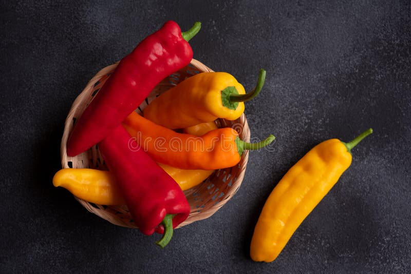 Colorful Long Sweet Peppers on Dark Background Stock Photo - Image of ...