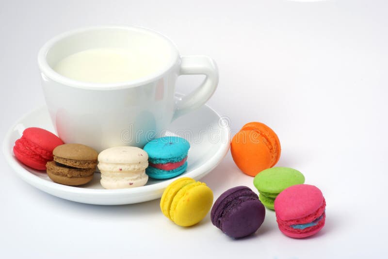 Colorful Macarons and Milk Cup Stock Photo - Image of french, pink ...