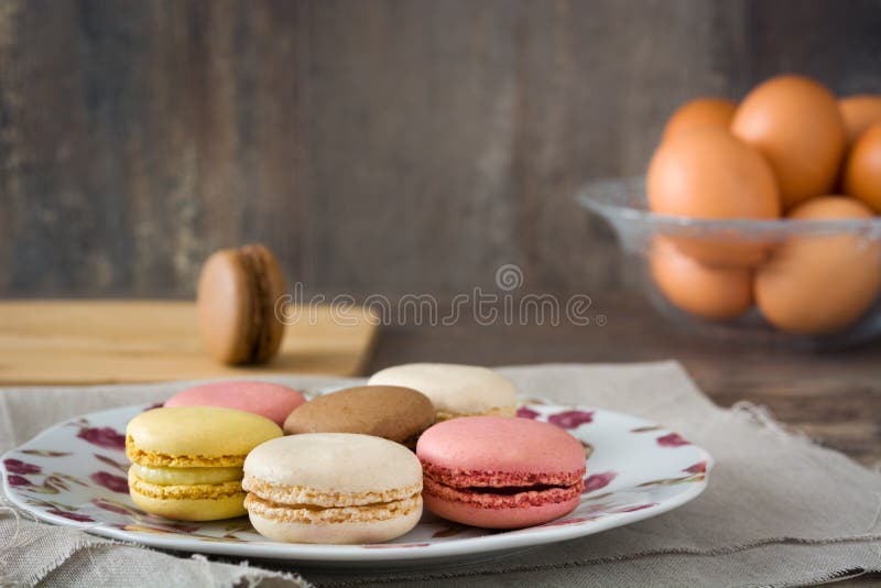 Sweet Colorful Cake Macaron In Plate On Wood Table Stock Image - Image ...