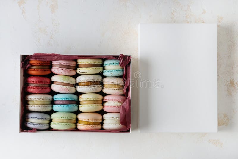 Colorful Macaroons in a Gift Box on a White Table. Stock Image - Image ...