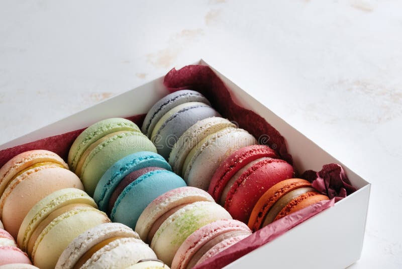 Colorful Macaroons in a Gift Box on a White Table. Stock Image - Image ...