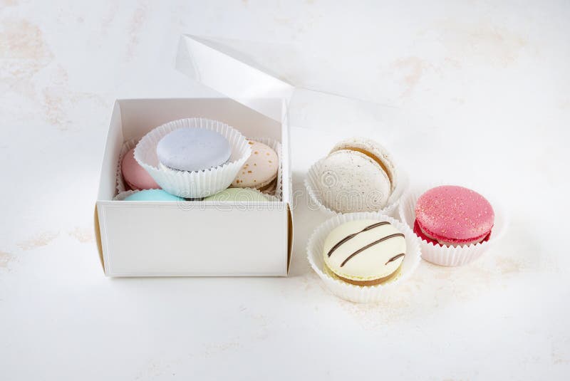 Colorful Macaroons in a Gift Box on a White Table. Very Soft Pastel ...
