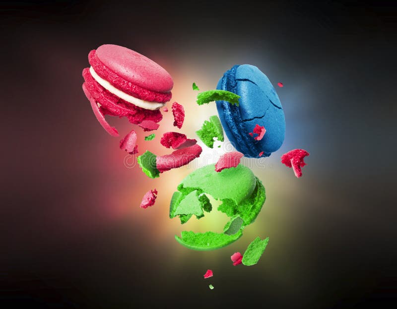 Colorful Macaroons are Torn To Pieces in the Air in the Dark Stock ...