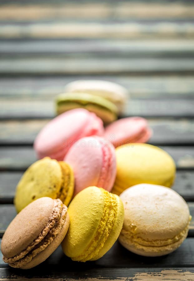 Colorful Macaroons on Wooden Background Stock Illustration ...