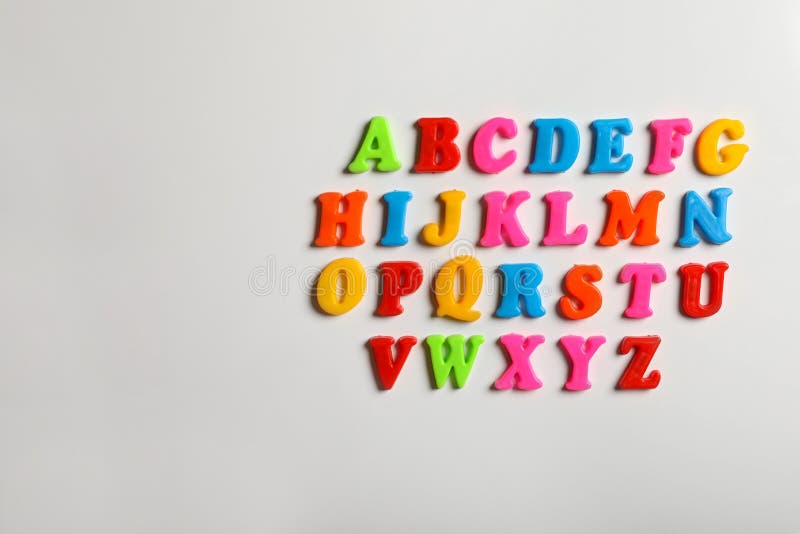Colorful Magnetic Letters on White Background, Flat Lay. Alphabetical ...