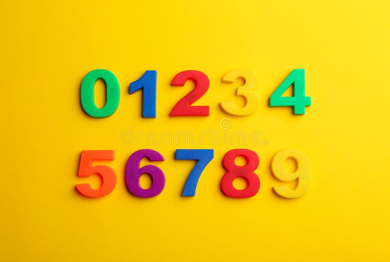 Colorful Magnetic Numbers on Yellow Background, Flat Lay Stock Photo ...