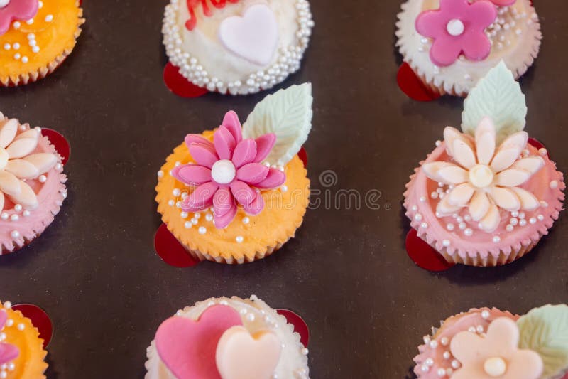 Colorful Marzipan Almongs Cakes with Decorative Marzipan Flowers Stock ...
