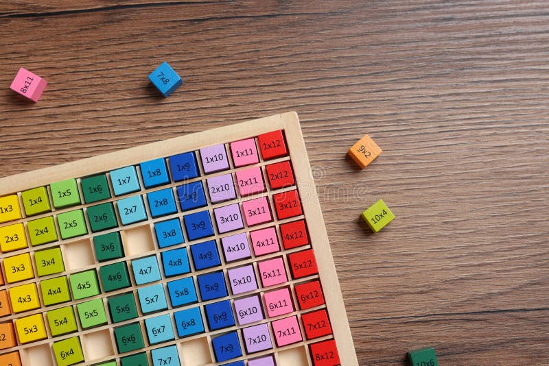 Colorful Math Game Kit with Arithmetical Tasks on Wooden Table, Flat ...