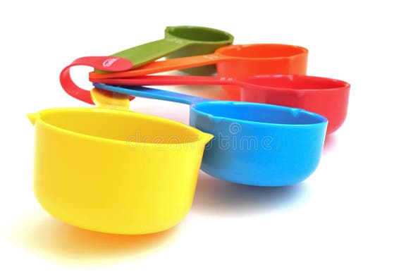 Colorful measuring cups stock photo. Image of yellow - 26484778