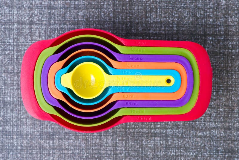 Colorful measuring cups stock image. Image of measuring - 79016899