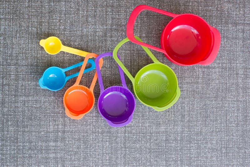 Colorful measuring cups stock photo. Image of equipment - 79016910