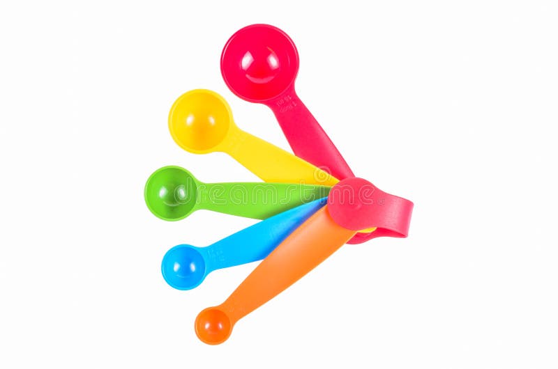 Colorful measuring spoons stock image. Image of bake - 75410493