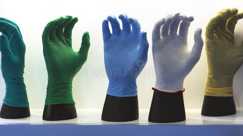 Colorful Medical Rubber Gloves on Artificial Hands Stock Image - Image ...