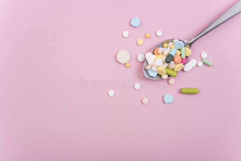 Pink medicine in spoon stock photo. Image of medicine - 5546790