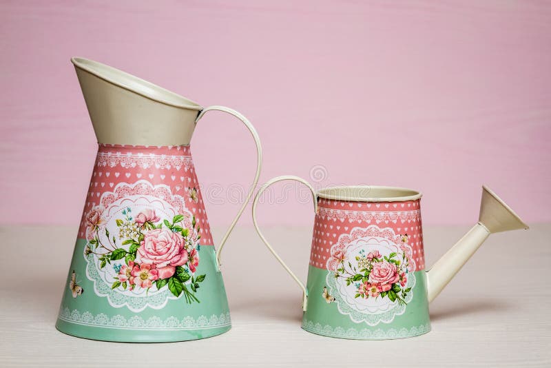 Colorful Metallic Watering Cans with Flower Pattern Stock Photo - Image ...