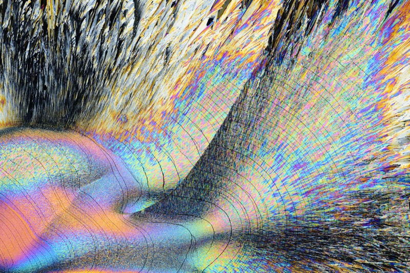 Colorful Micro Crystals in Polarized Light. Photo through a Microscope ...
