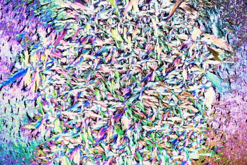 Colorful Micro Crystals in Polarized Light. Photo through a Microscope ...