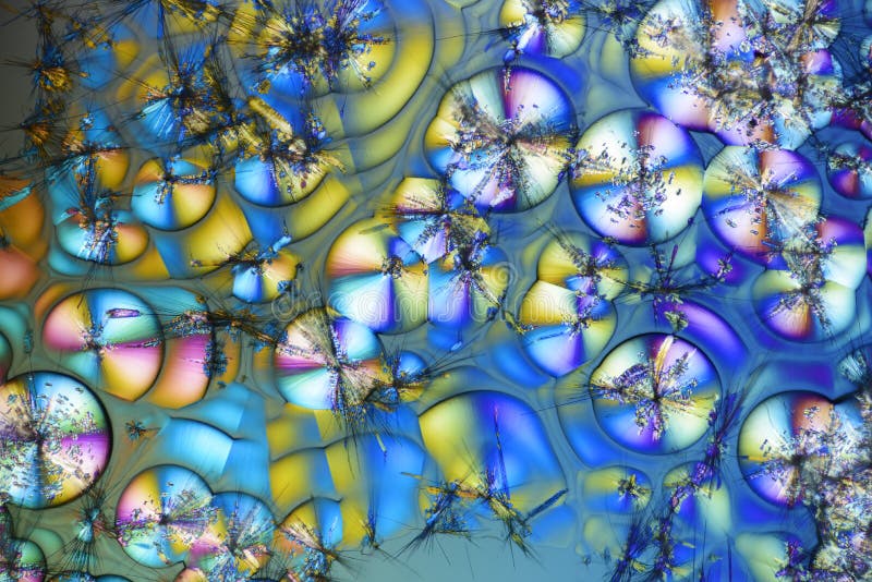 Colorful Micro Crystals in Polarized Light. Photo through a Microscope ...
