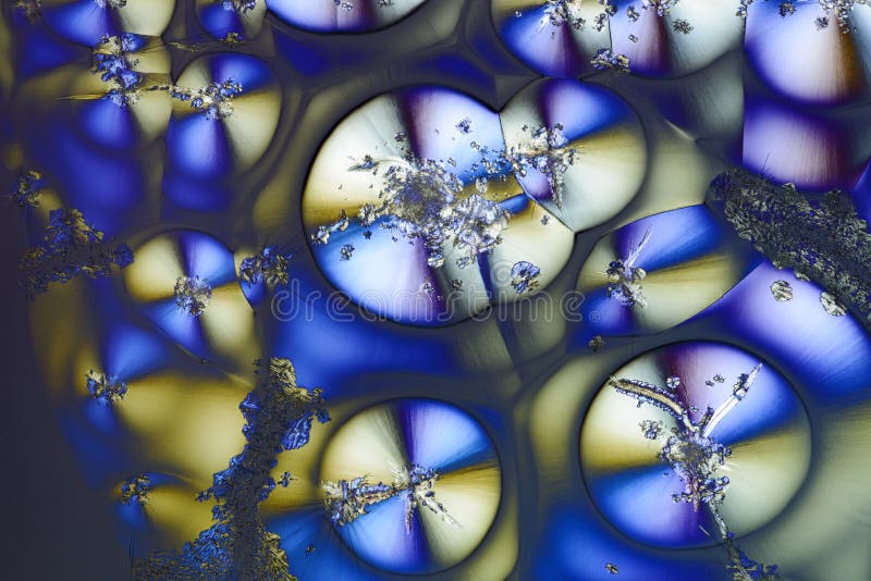Colorful Micro Crystals in Polarized Light. Photo through a Microscope ...