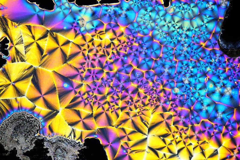 Colorful Micro Crystals in Polarized Light. Photo through a Microscope ...