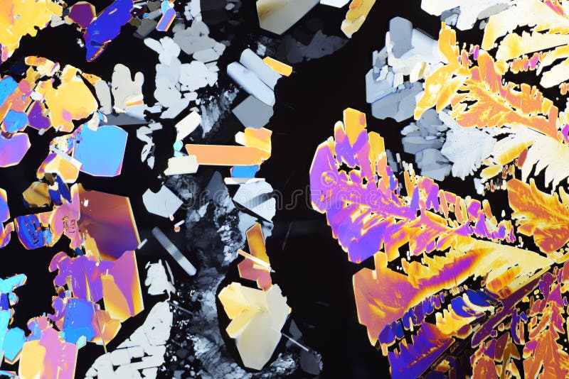 Colorful Micro Crystals in Polarized Light. Photo through a Microscope ...
