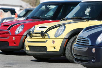Colorful Mini Cooper cars stock photo. Image of economic - 1889332