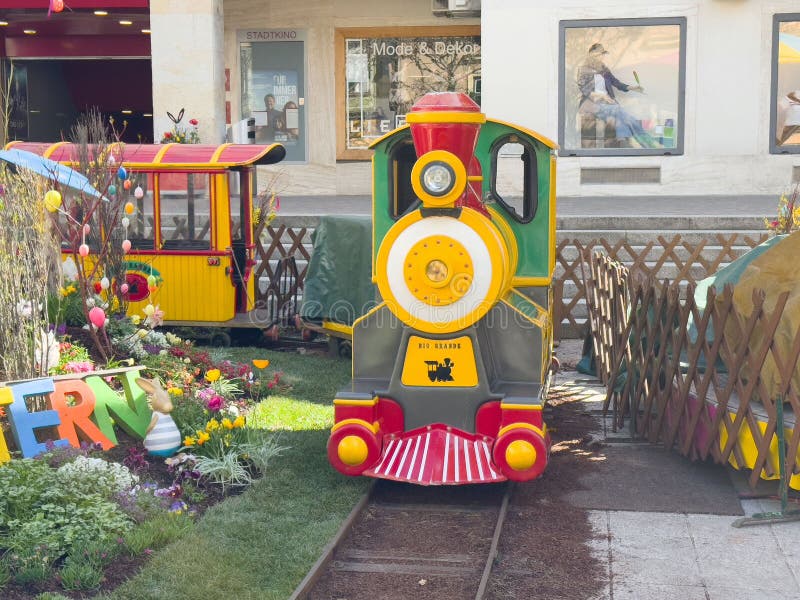 Colorful Miniature Train Ride in Vibrant Urban Setting in Villach ...