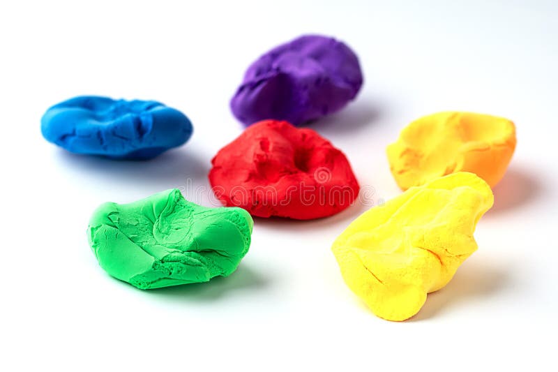 Colorful Modeling Clay Pieces Arranged on a White Background, Vibrant ...