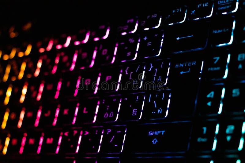 Colorful Modern Keyboard with Rainbow Backlight on Black Background ...