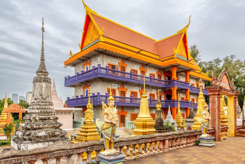 Colorful Monkey Buddist Temple Surrounded by Stupas and Statues, Phnom ...