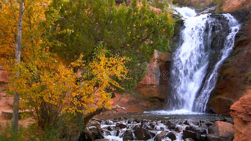 Mountain Waterfall with Yellow and Green Trees Stock Photo - Image of ...
