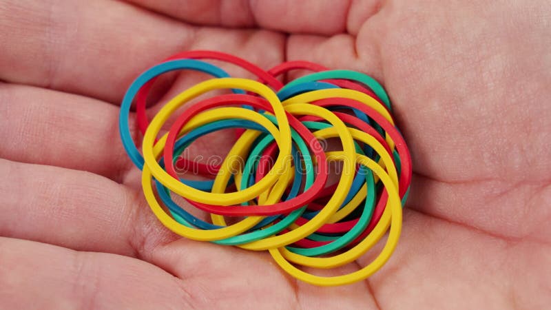 Colorful Multi Coloured Rubber Bands in Hand Stock Video - Video of ...