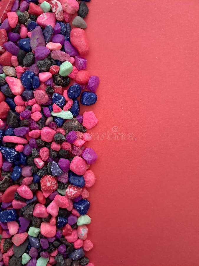 Colorful Multicolor Stones on a Red Background Stock Photo - Image of ...