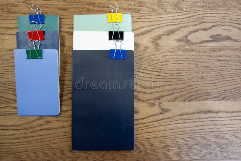 Colorful Notebooks with Large Paper Clips Stock Photo - Image of books ...