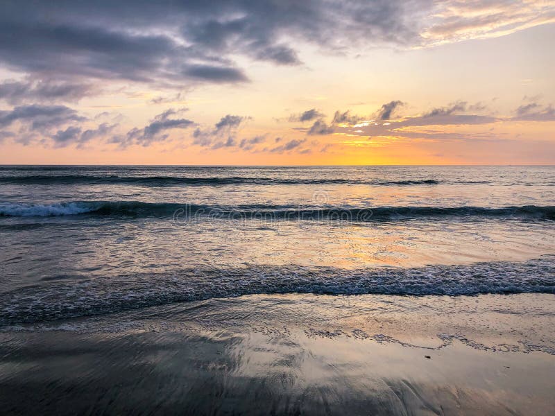 Colorful Ocean Beach Sunset Facing the Sun Stock Photo - Image of ocean ...