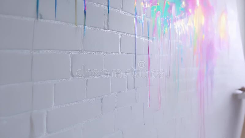 Colorful Paint Drips on a White Brick Wall with Modern Table in the ...