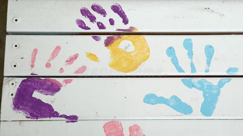 Colorful Painted Handprints on Wooden Planks Stock Photo - Image of ...