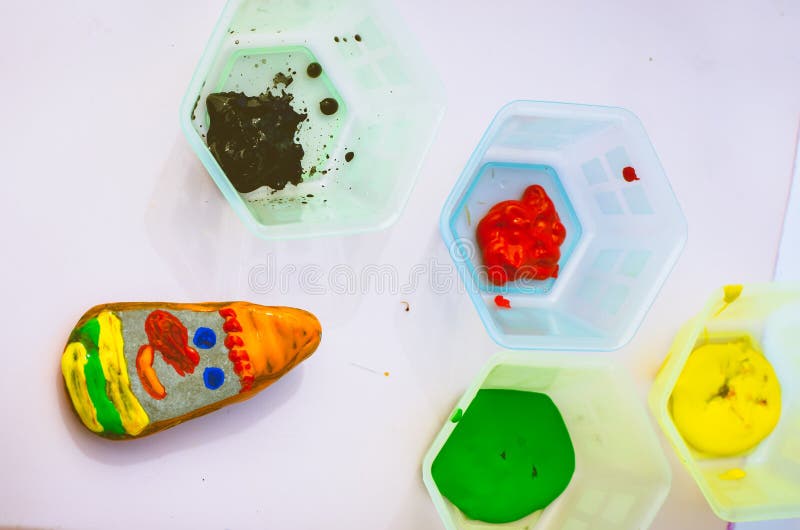 Colorful painted pebbles stock image. Image of rock - 118733629