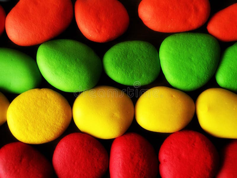 Stones with Painted Flowers and Leaves Stock Photo - Image of ...