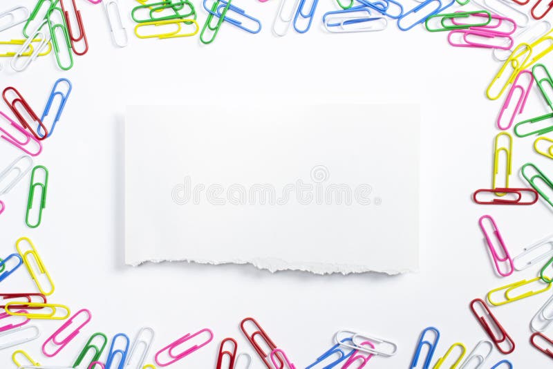 Colorful Paper Clips and Torned Paper Frame in the Centre of ...