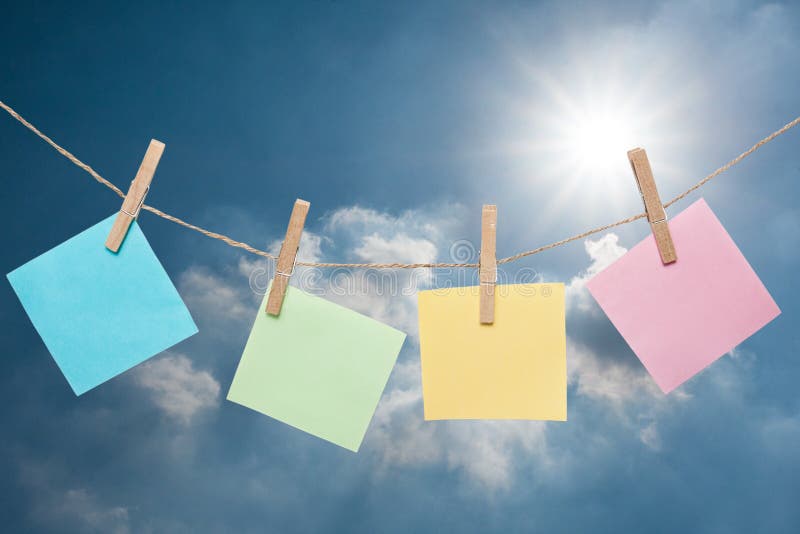 Colorful of Paper Note with a Pin Against the Blue Sky Stock Photo ...