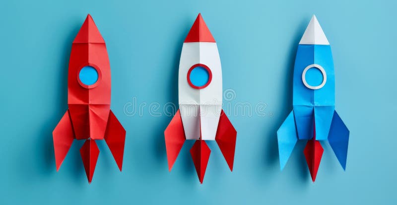 Colorful Paper Rockets on Blue Background Representing Creativity and ...