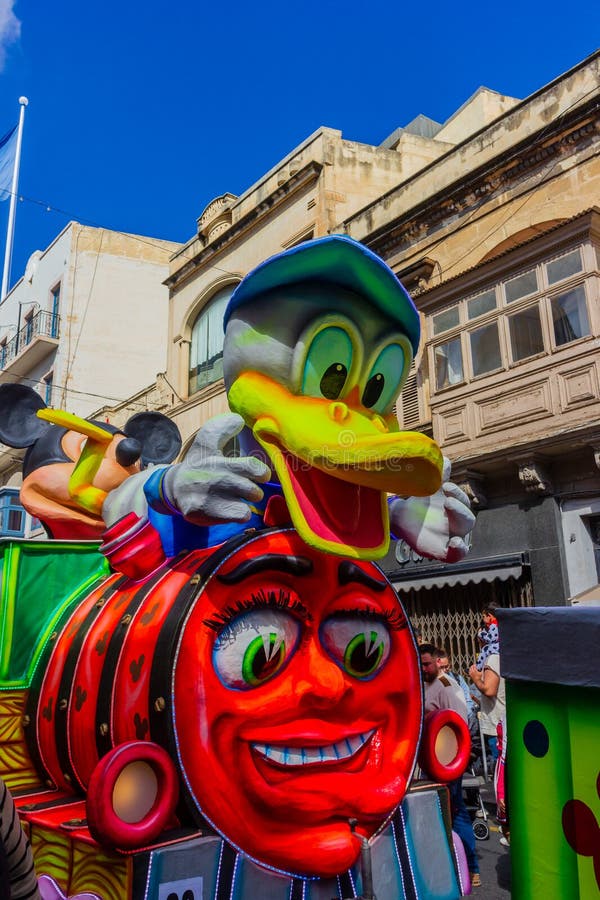 Colorful Parade Float Featuring Cartoon Characters in an Urban Setting ...