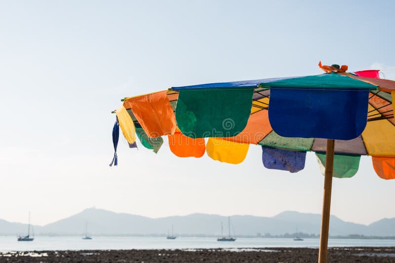 Colorful Parasol on the Beach Stock Photo - Image of travel, sunlight ...