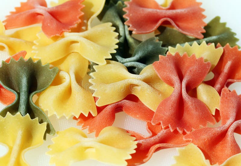 Dry Pasta Bows Farfalle. Heap of Bow Tie Macaroni Isolated on White ...