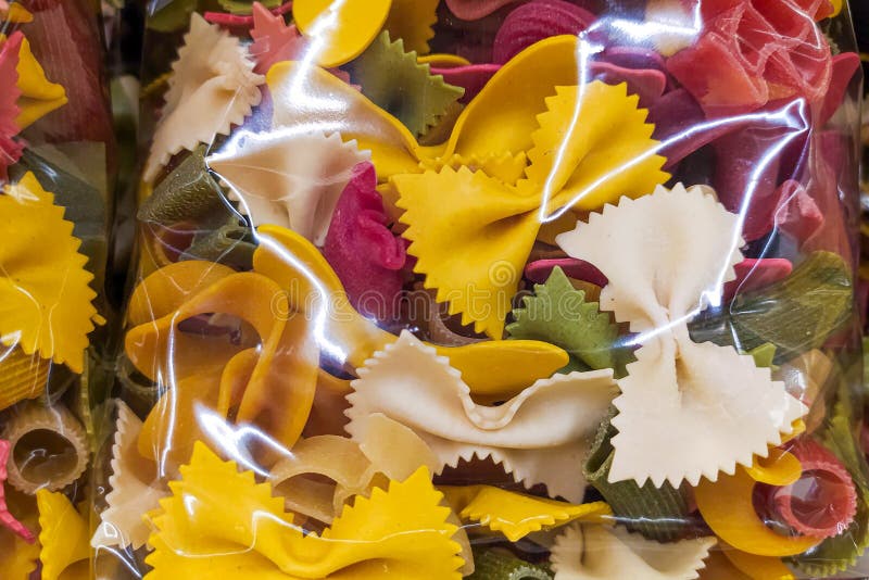 Colorful Pasta is Packed in Cellophane Packaging. Abstract Pasta ...